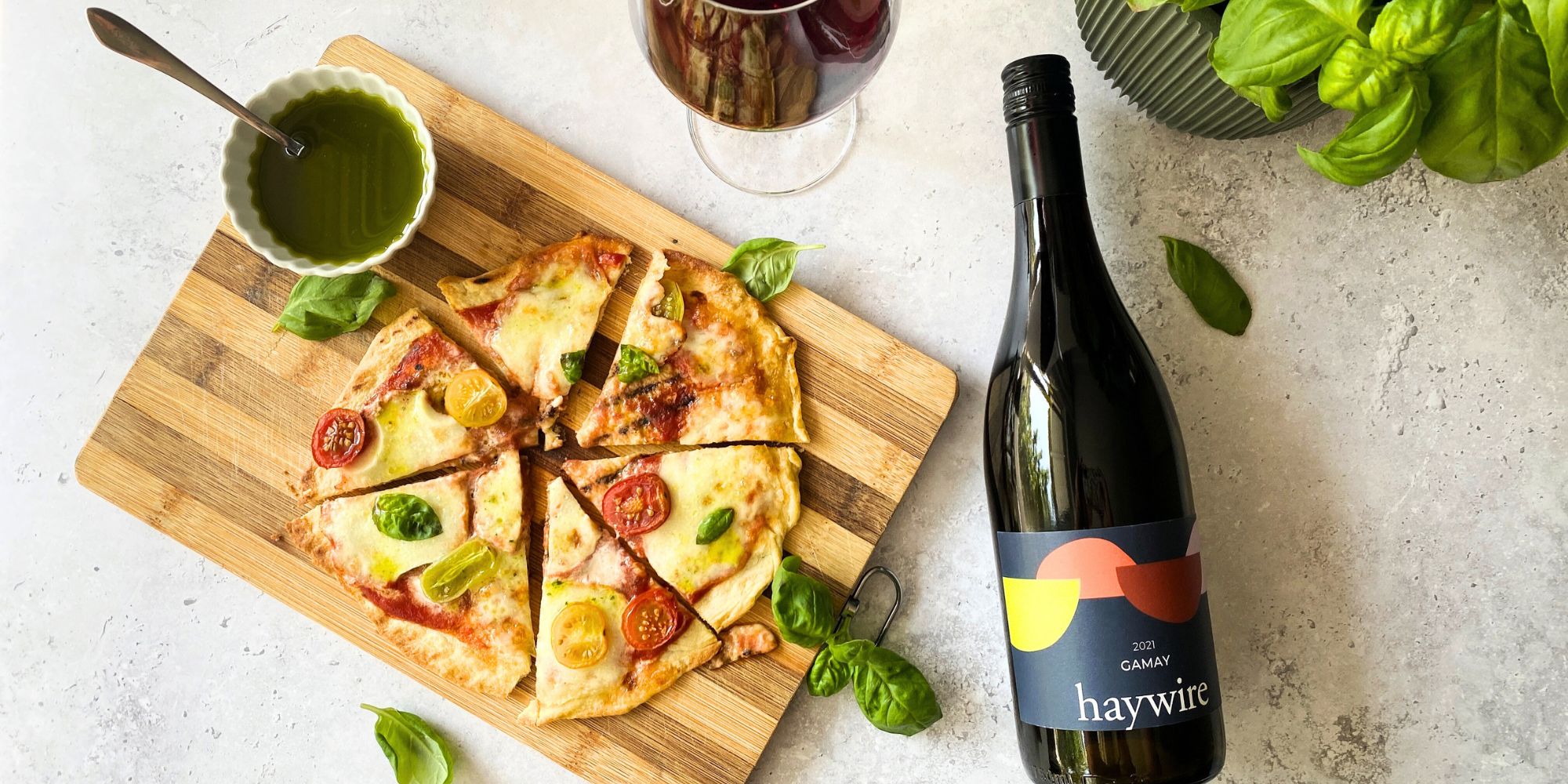 Grilled Tomato & Fior di Latte Pizza with Basil Oil - Haywire Winery